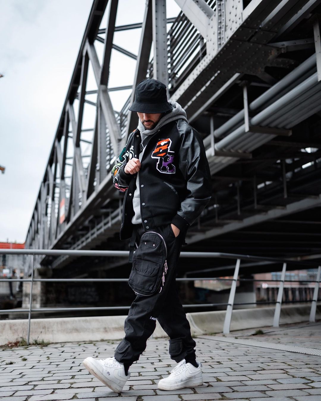 Mastering cool: 43 men's varsity jacket outfits for every occasion ...