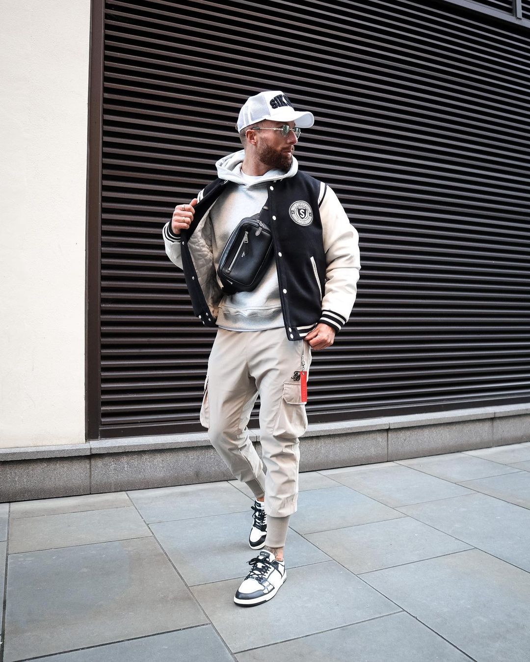 Mastering cool: 43 men's varsity jacket outfits for every occasion ...